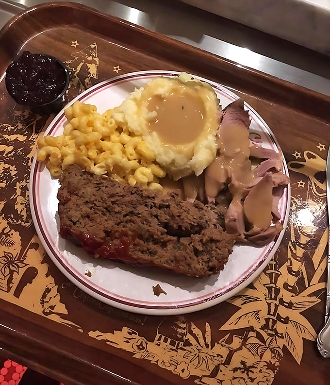 Comfort food doesn't get more nostalgic than this: hearty meatloaf, creamy mashed potatoes, and mac & cheese that would make your grandmother nod in approval.