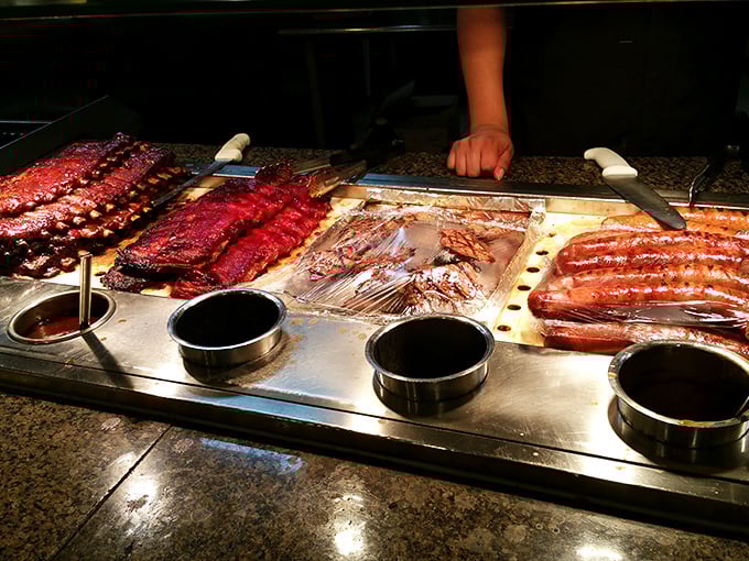 Glistening barbecued ribs and succulent meats await their fate alongside dipping sauces. This meat lover's paradise could convert even the most committed salad enthusiast.