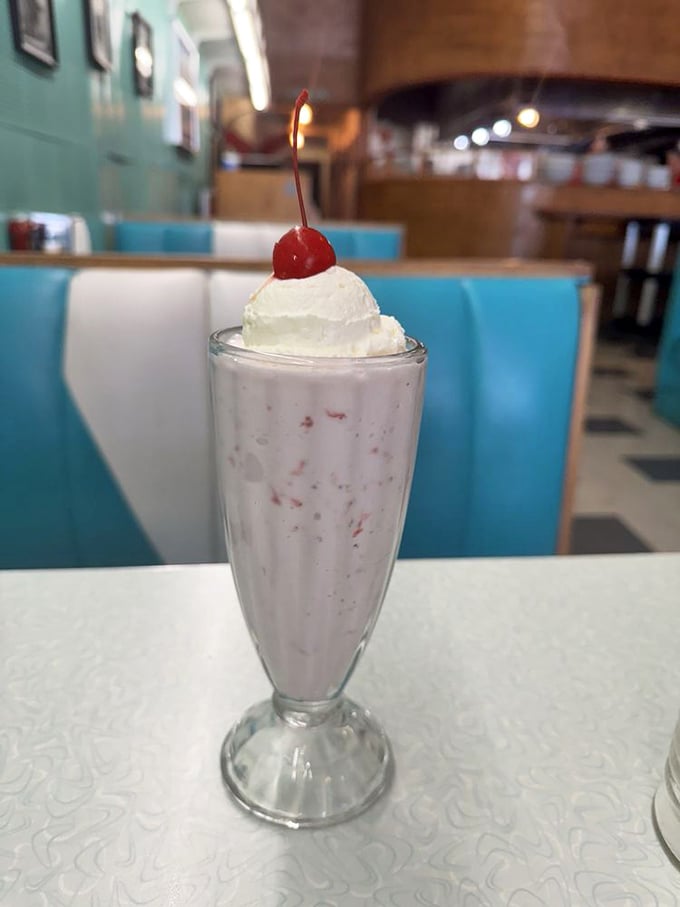 The cherry-topped milkshake isn't just dessert, it's therapy in a glass&mdash;creamy, dreamy, and worth every calorie.