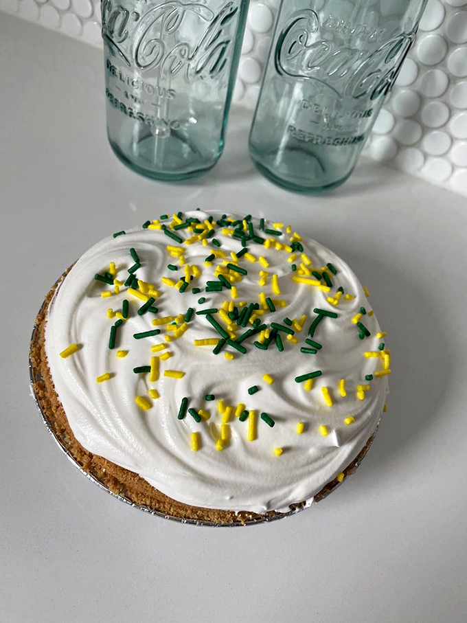This Key Lime pie with festive sprinkles isn't just dessert—it's a celebration on a plate. The green and yellow confetti announce its arrival.