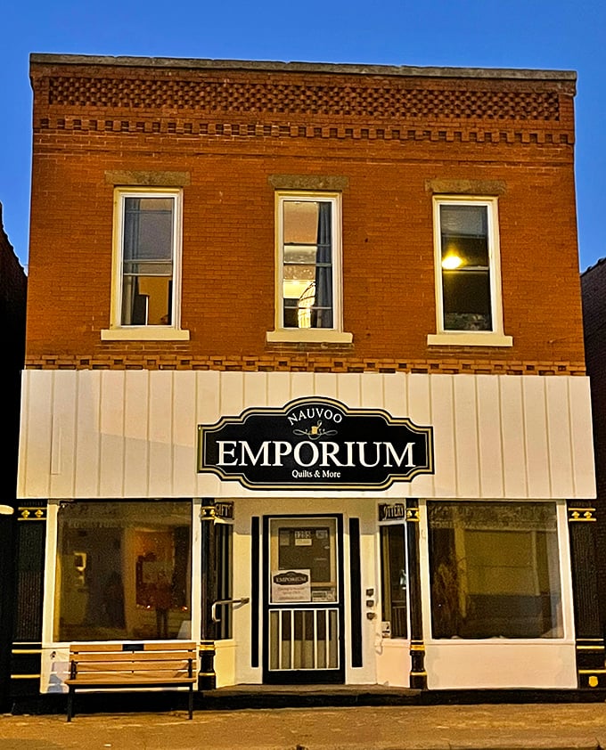 The Nauvoo Emporium beckons fabric enthusiasts with its promise of quilts and crafts housed in a beautifully preserved brick building.
