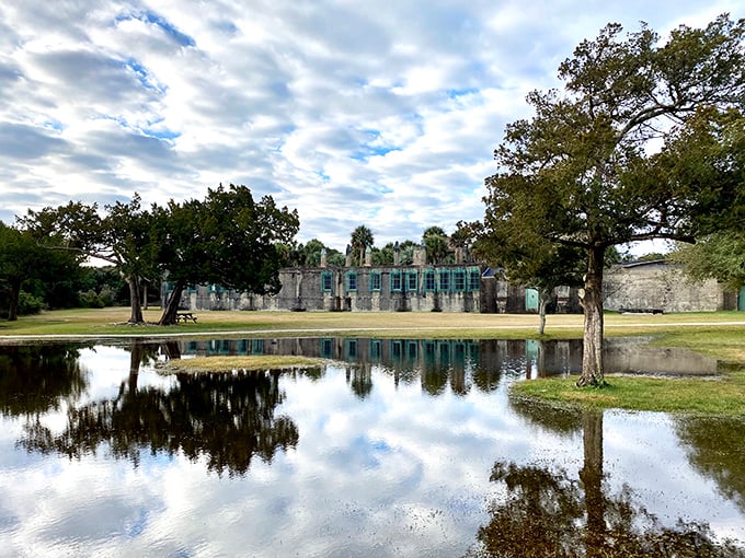 Atalaya Castle reflects beautifully in the adjacent pond, creating a double dose of architectural splendor against the Carolina sky.