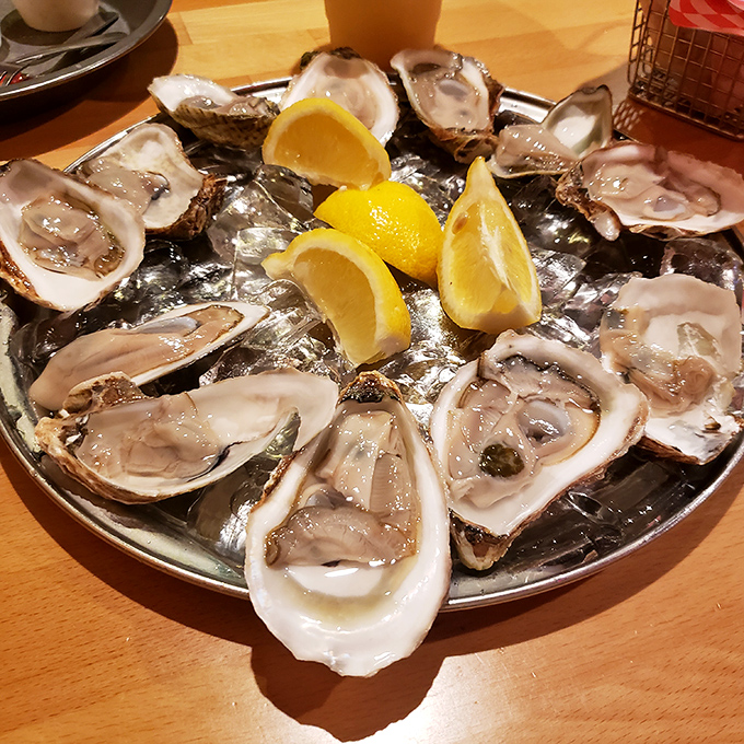 These oysters aren't just served; they're presented like jewels on ice. A squeeze of lemon is all that stands between you and briny perfection.