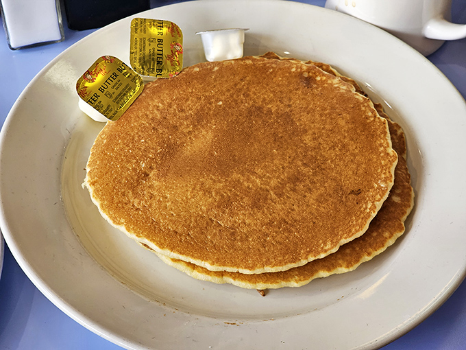Golden-brown pancakes that span the plate's horizon &ndash; the breakfast equivalent of a warm hug from your favorite aunt.