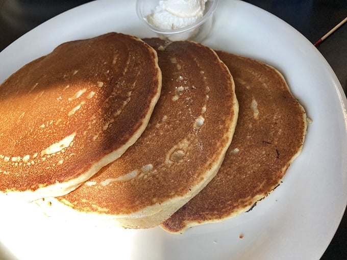 Golden-brown pancakes with the perfect rise and color gradient that whispers, "Yes, these were made by someone who actually cares about breakfast."