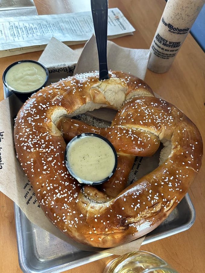 Not all heroes wear capes – some come shaped like pretzels with golden-brown exteriors and two perfect pools of beer cheese.