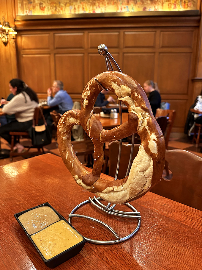 Perched like royalty on its metal throne, this pretzel demands respect&mdash;and two dipping sauces. Resistance is futile.