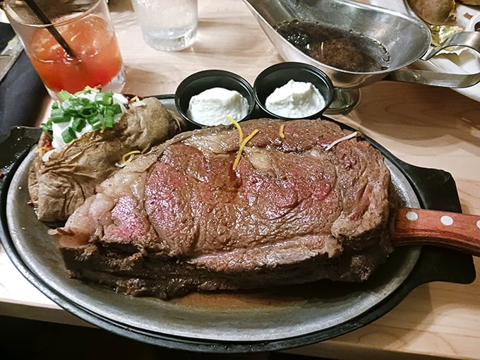 Behold the star of the show – prime rib so perfectly executed it makes vegetarians question their life choices, served with horseradish that clears sinuses three counties away.