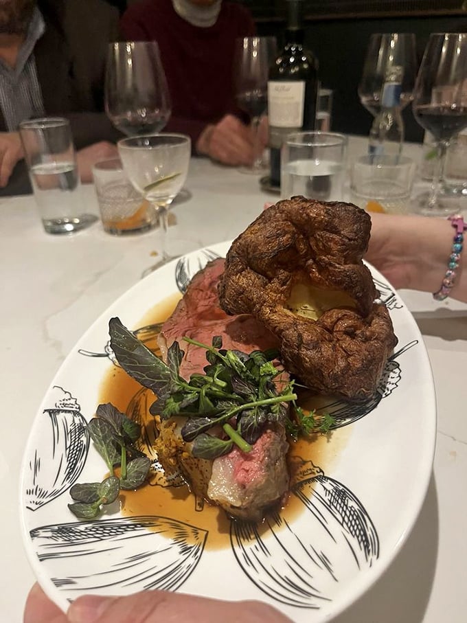 This isn't just prime rib; it's a carnivore's sonnet with a perfectly pink center and a Yorkshire pudding crown fit for royalty.