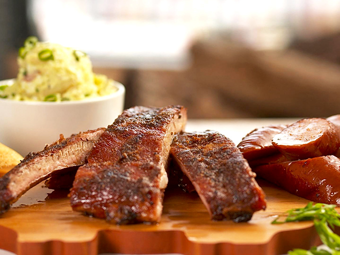 Ribs with that perfect bark, coleslaw that cuts the richness, and sides that demand equal attention. This isn't a meal&mdash;it's a carnivore's dream sequence.