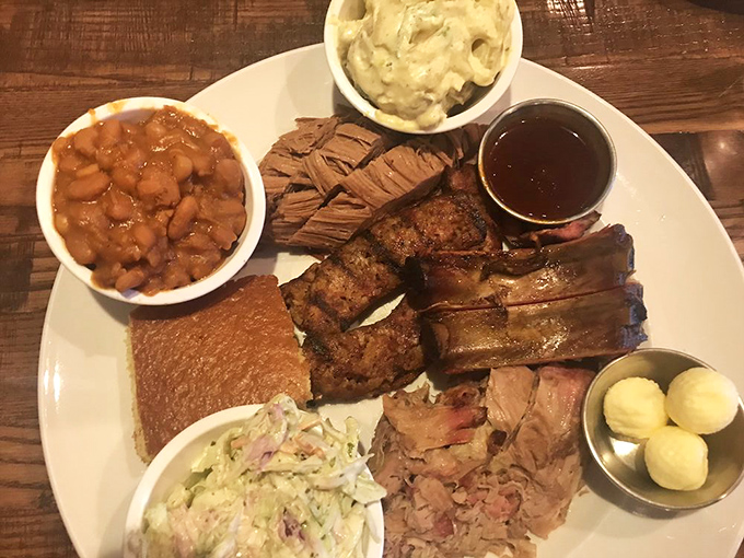 BBQ perfection on a plate! The sampler platter lets you experience the full spectrum of smoky goodness with sides that don't play second fiddle.