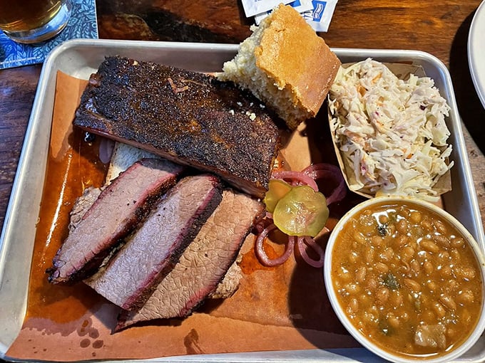 Brisket with that perfect smoke ring, beans that didn't come from any can, and cornbread that would make a Southerner nod in approval.