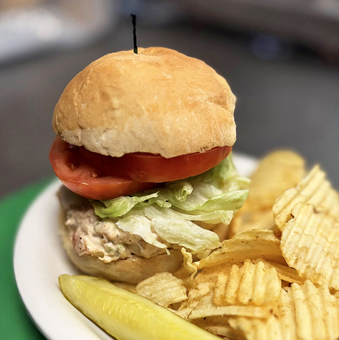 Not all heroes wear capes – some come on a soft roll with crisp lettuce, juicy tomato, and a side of potato chips.