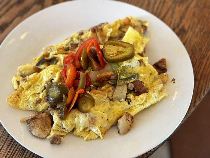 This omelet doesn't just have ingredients; it has ambitions. Jalape&ntilde;os, peppers, and mushrooms staging a delicious rebellion against boring breakfasts everywhere. 