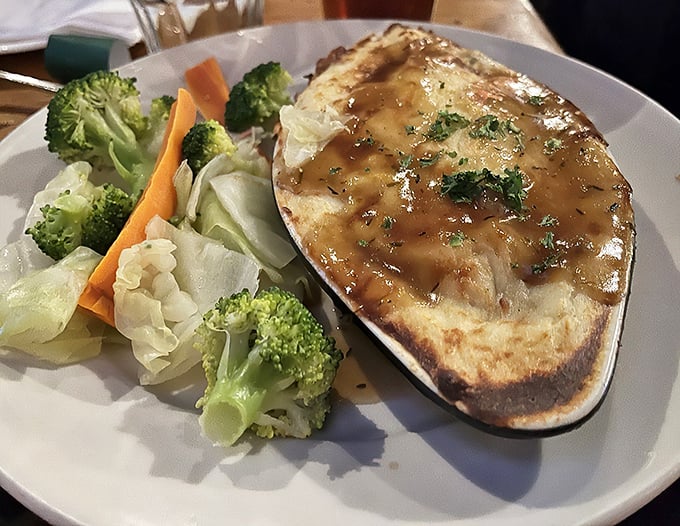 Behold the legendary Shepherd's Pie in all its glory! That golden-brown crust hiding savory treasures beneath is worth every mile driven.