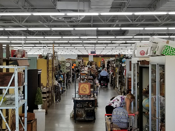 Down every aisle, shoppers become archaeologists of Americana, carefully examining artifacts from decades past while mentally rearranging their living rooms to accommodate new treasures.