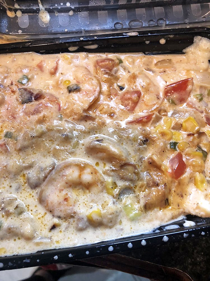 Shrimp and grits so creamy they should require a permission slip. Those plump shrimp are practically doing the backstroke in that luxurious sauce.