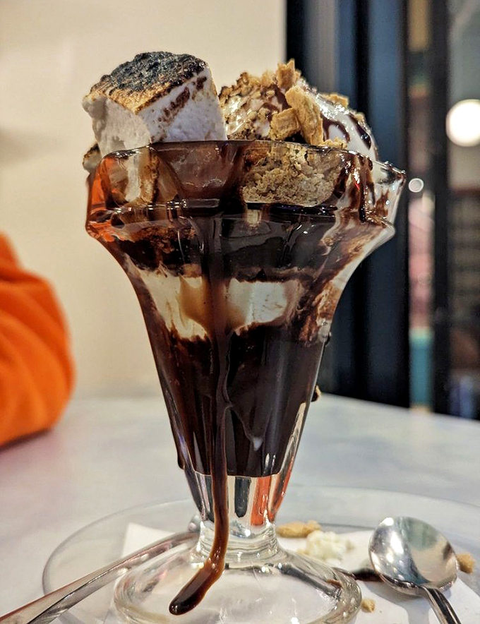 Not so much a sundae as an architectural achievement. Those toasted marshmallows perched atop chocolate like a sweet Everest waiting to be conquered.