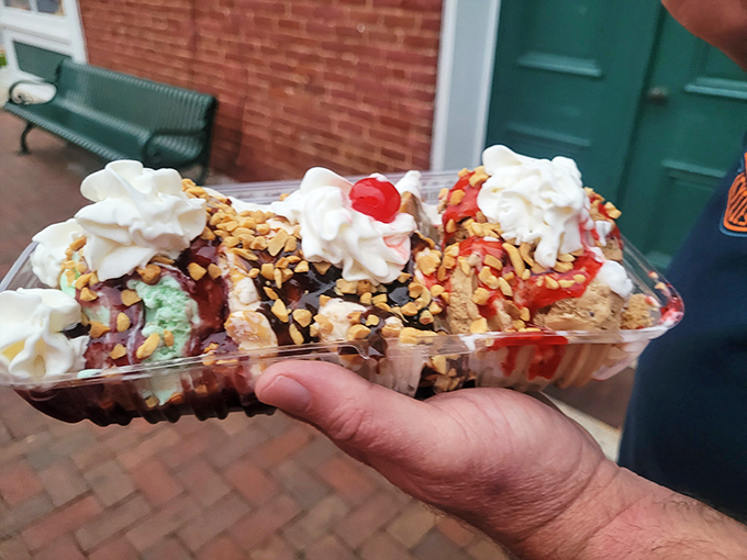 Behold: ice cream architecture at its finest. Those layers of flavor, sauce, and toppings create a structural masterpiece that would make Frank Gehry jealous.