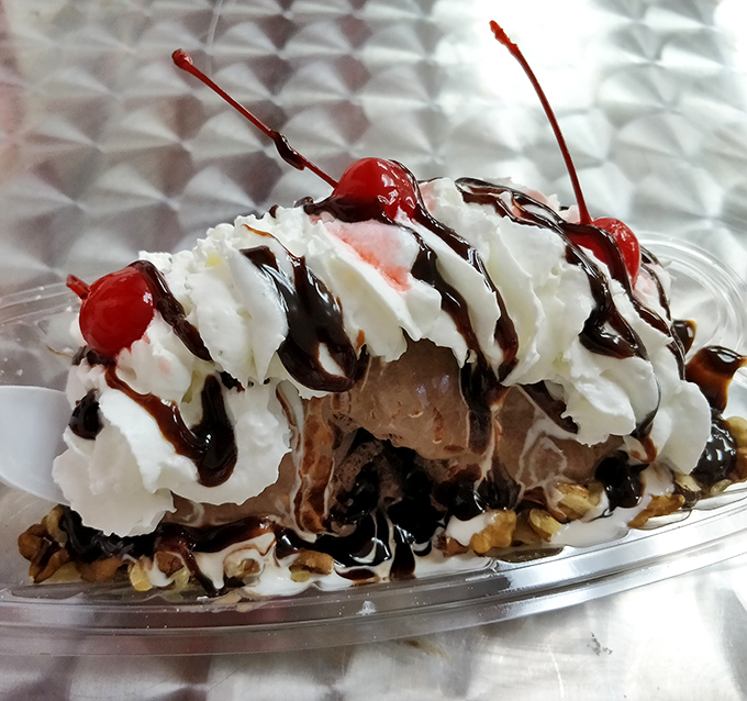 This isn't just a sundae&mdash;it's an architectural masterpiece where hot fudge cascades over cold cream, topped with cherries that practically wink at you.