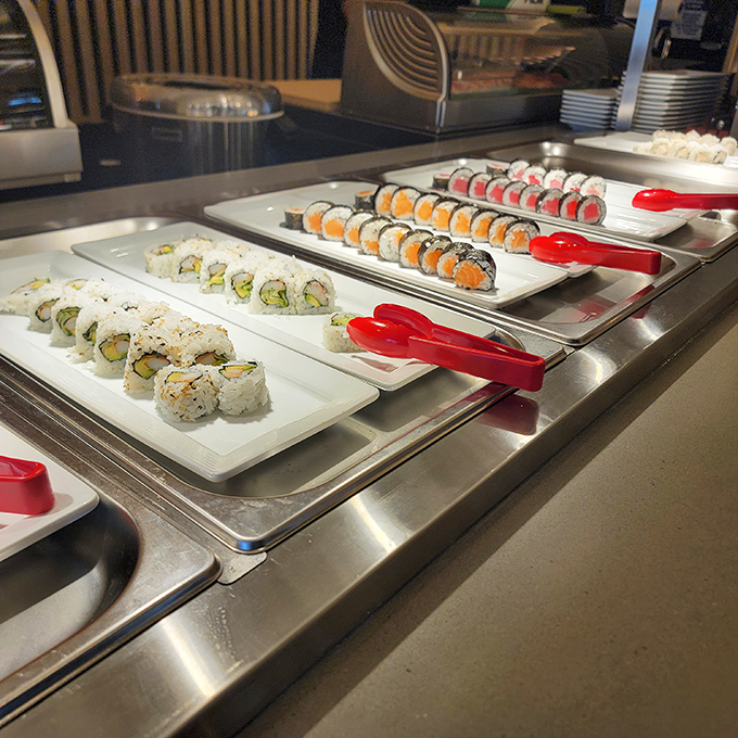 Sushi rolls lined up like colorful soldiers, ready to march straight into your heart. Fresh, vibrant, and calling your name.