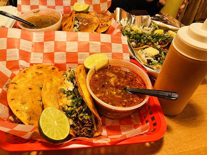 These tacos aren't just served&mdash;they're presented with pride. The lime wedges stand ready like tiny flavor grenades waiting to elevate each bite.