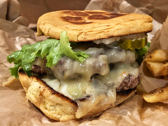 This isn't just a burger&mdash;it's a masterpiece of melty cheese cascading down a perfectly seared patty. Pure handheld happiness between two buns.