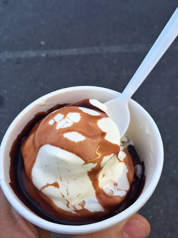 Hot fudge meets cold custard in a temperature tango that would make Dancing with the Stars judges weep. The contrast is everything.