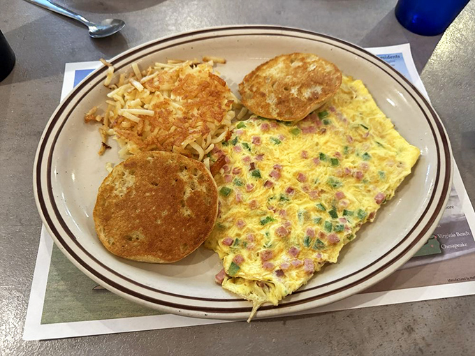 This Western Omelet doesn't just feed you&mdash;it sustains you through winter. Ham, peppers, and cheese nestled in fluffy eggs with perfect hash browns.