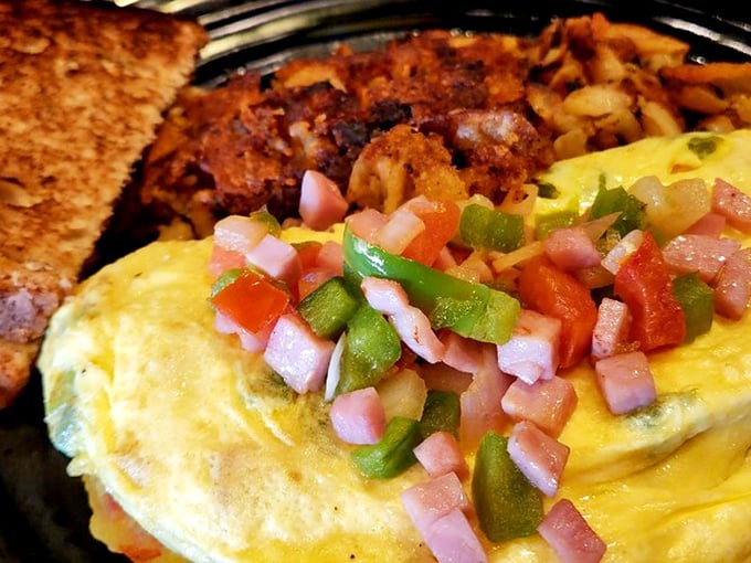 Sunshine on a plate! This fluffy omelet topped with fresh pico de gallo is what morning glory looks like in edible form.