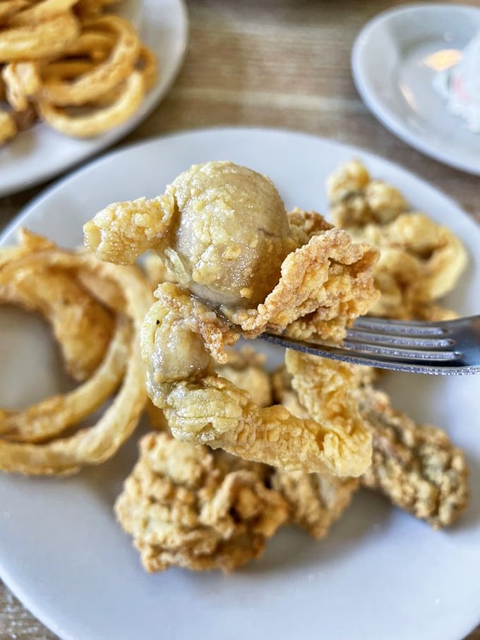Golden-fried whole belly clams that make you close your eyes with each bite. The kind of food that demands a moment of silence.