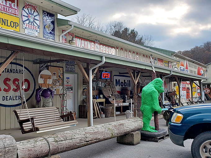 Wayne's Flea Market is a wonderland of Americana where that green dinosaur might just be guarding the exact vintage sign you've been searching for your whole life.