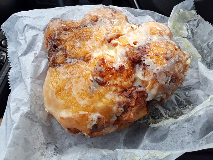 The legendary apple fritter in all its glistening glory. This isn't just breakfast—it's an edible monument to what happens when apples fulfill their highest calling.