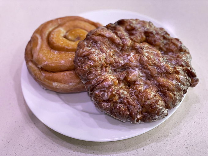 The apple fritter and cinnamon bun: a dynamic duo that belongs in the Breakfast Hall of Fame. One bite and you'll understand why people set alarms for these.