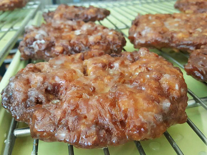 These apple fritters aren't just donuts; they're edible works of art. Crispy, gooey, and big enough to use as a pillow.