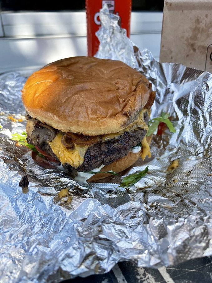 Wrapped in foil like the precious gift it is, this bacon cheeseburger doesn't need fancy plating when it's packing this much flavor.