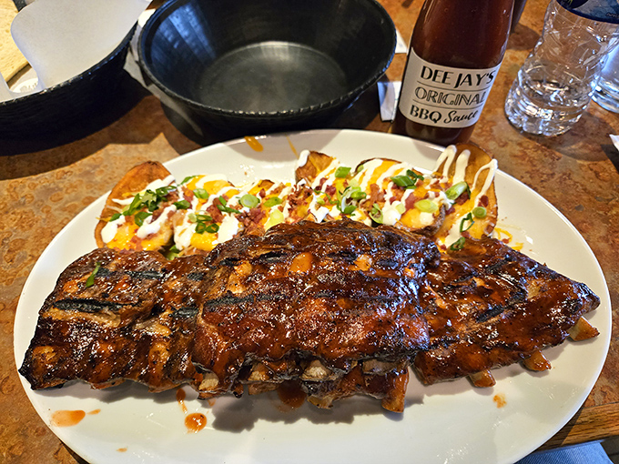 These aren't just ribs; they're edible evidence that patience is indeed a virtue. That glistening sauce could make a vegetarian question their life choices.