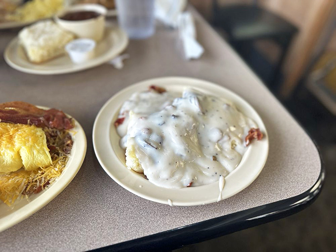 Biscuits and gravy so good they'd make your grandmother both jealous and proud. That cream gravy blanket isn't just comfort food&mdash;it's a full-on comfort comforter.