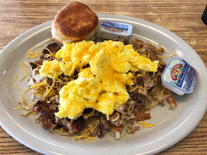 Hashbrowns that crunch, eggs that ooze, and a biscuit that could make your grandma jealous. This breakfast plate doesn't need filters to look this good.