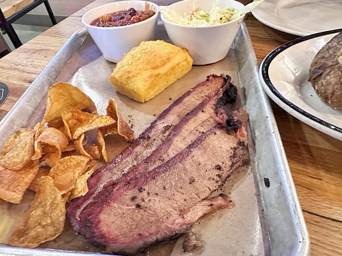 Behold the brisket in all its pink-ringed glory! That smoke ring isn't just for show&mdash;it's nature's way of saying "you've made an excellent life choice today."