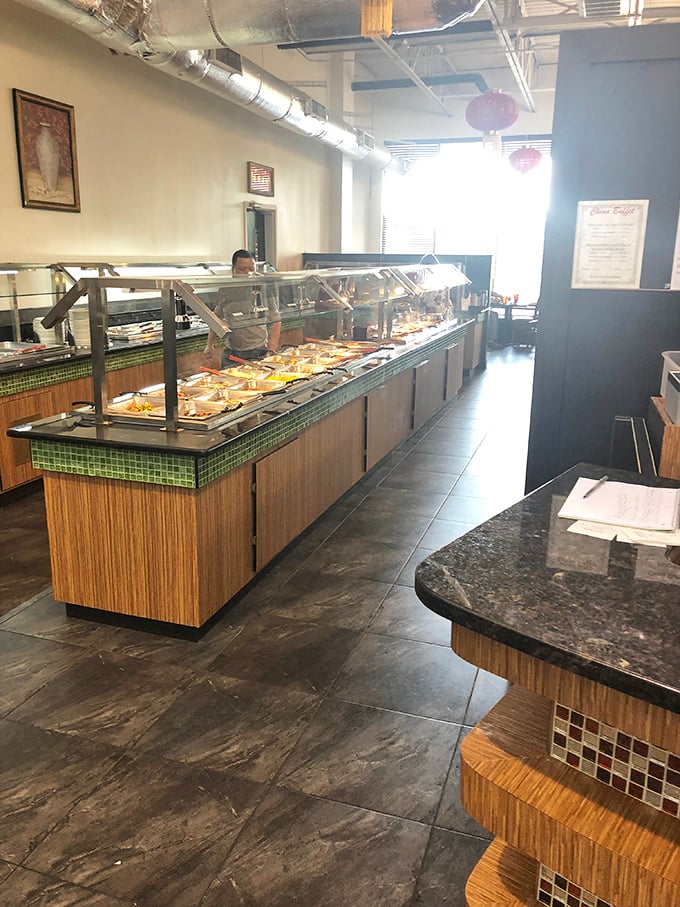 Behold the buffet line in all its glory! Those steam trays aren't just holding food&mdash;they're holding dreams, possibilities, and tomorrow's leftovers.