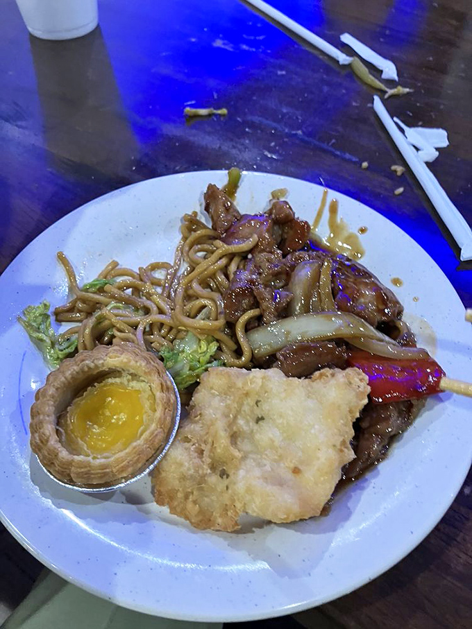 Lo mein noodles tangle with beef and a crispy egg tart&mdash;the buffet plate equivalent of "I couldn't decide, so I got everything." We've all been there.