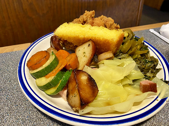 Southern comfort meets vegetable virtue on a single plate. That cornbread isn't just yellow&mdash;it's a golden ticket to carbohydrate paradise.