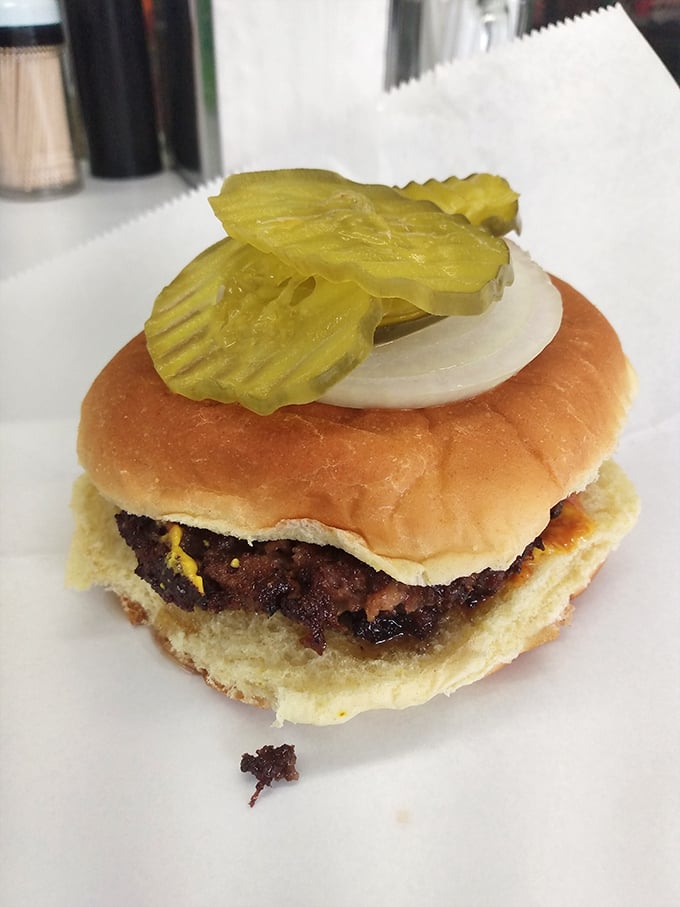 This isn't just a burger; it's a Kentucky heirloom. The perfectly seared patty and pickle-onion combo creates a symphony of flavors.