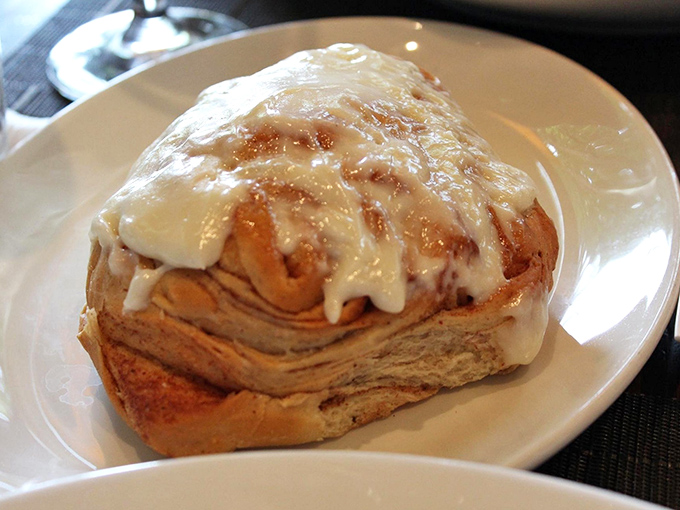Not just a cinnamon roll, but a spiritual experience&mdash;layers of buttery pastry crowned with cream cheese icing that melts into every heavenly crevice.