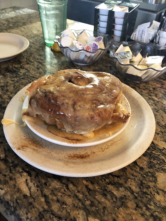 The legendary cinnamon roll in all its glory&mdash;where frosting meets cinnamon in a relationship more perfect than any Hollywood romance.