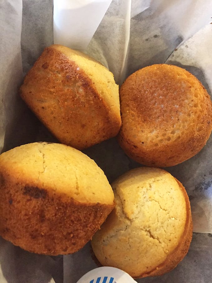 Golden cornbread muffins with that perfect crisp exterior and tender center. These aren't just sides—they're essential supporting characters.