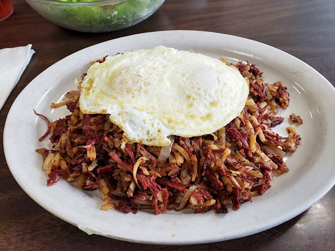 Corned beef hash that doesn't come from a can, topped with eggs so perfectly cooked they deserve their own Instagram account.