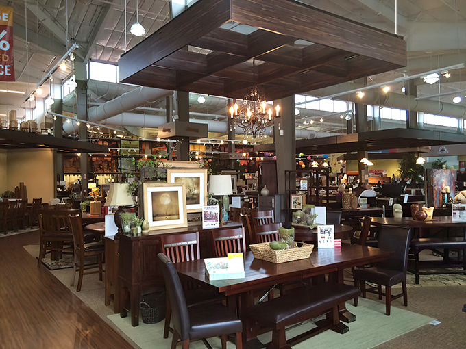 The cathedral ceilings and warm wood tones make this dining section feel like you're browsing in a Pinterest board come to life.