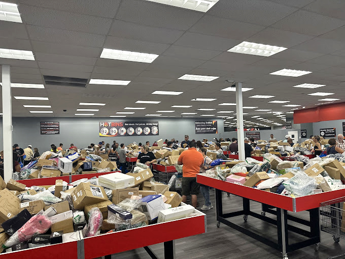 The view that greets you upon entry: a sea of red bins stretching to the horizon, filled with possibilities and that "what will I find today?" excitement.